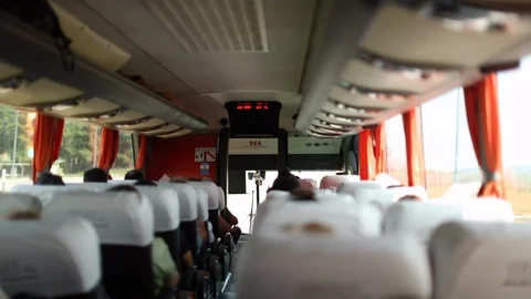 Back of bus traveling on road trip. Pass... | Stock Video | Pond5