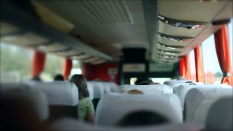 Back of bus traveling on road trip. Pass... | Stock Video | Pond5