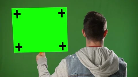 Back of man holding a green screen chrom... | Stock Video | Pond5