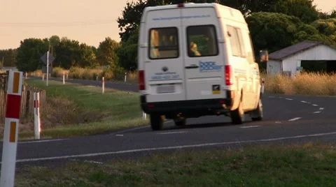 Back packer van driving past and away fr... | Stock Video | Pond5