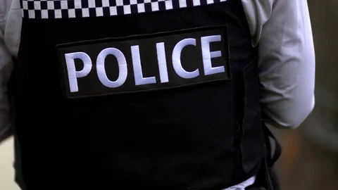 Back of a Police Officer in Uniform on P... | Stock Video | Pond5