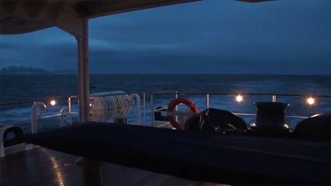Back of ship at night on background of m... | Stock Video | Pond5