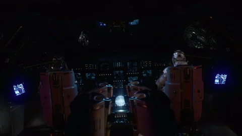 Back shot of astronauts in the cockpit o... | Stock Video | Pond5