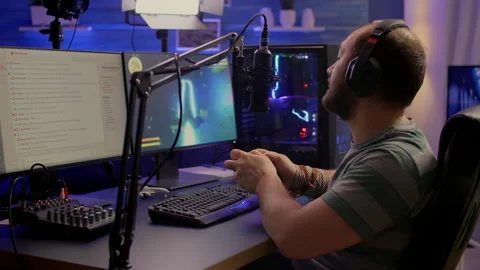 Back shot of pro streamer playing graphi... | Stock Video | Pond5
