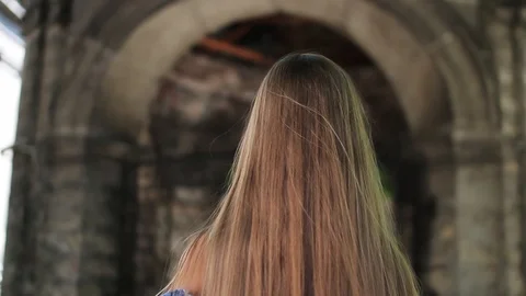Back shot of young girl with long fabulo... | Stock Video | Pond5