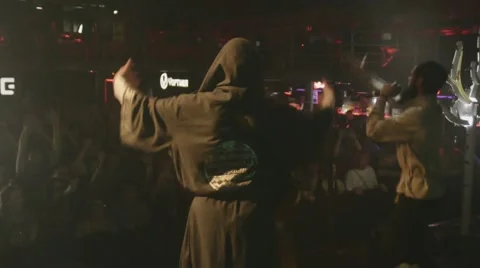 Back side of vocalist in mantle on stage... | Stock Video | Pond5