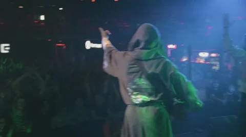 Back side of vocalist in mantle on stage... | Stock Video | Pond5