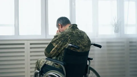 Back view of army veteran with disabilit... | Stock Video | Pond5