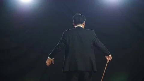 Back View Of Asian Conductor Man Holding... | Stock Video | Pond5
