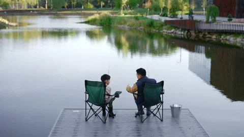 Back view of the asian family fishing to... | Stock Video | Pond5
