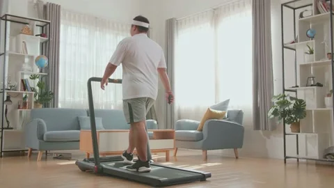 Back View Of Asian Fat Man Training On W... | Stock Video | Pond5