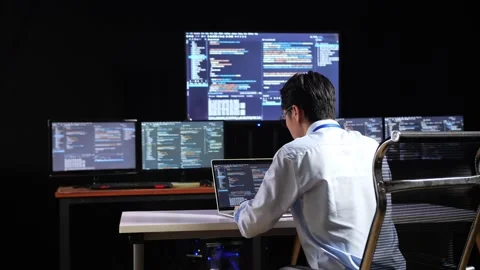 Back View Of Asian Male Programmer Writi... | Stock Video | Pond5