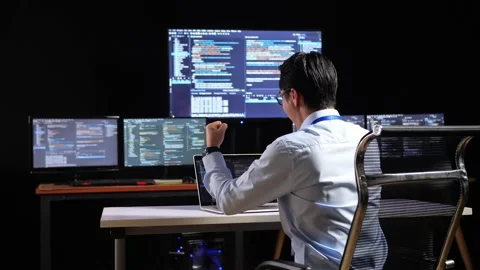 Back View Of Asian Male Programmer Celeb... | Stock Video | Pond5