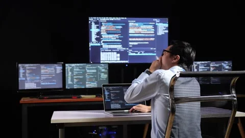 Back View Of Asian Male Programmer Yawni... | Stock Video | Pond5