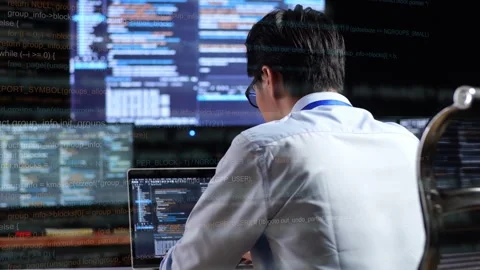 Back View Of Asian Male Programmer Writi... | Stock Video | Pond5