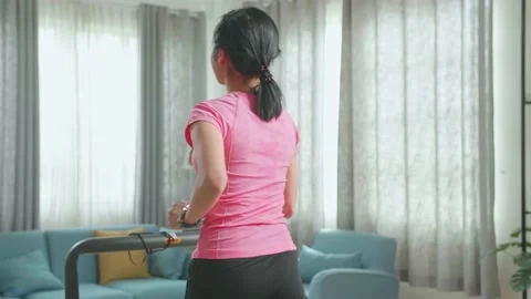 Back View Of Asian Woman Running On A Tr... | Stock Video | Pond5
