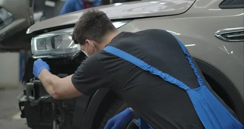 Back view of auto mechanic in coronaviru... | Stock Video | Pond5