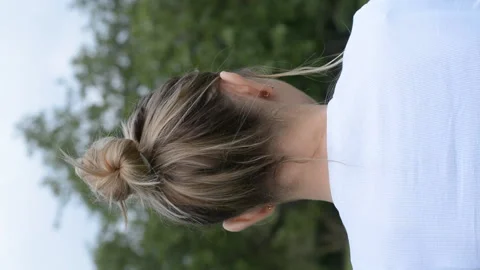 Back view of blonde hair female head | Stock Video | Pond5