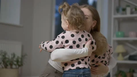 Back view of cheerful cute baby girl wal... | Stock Video | Pond5