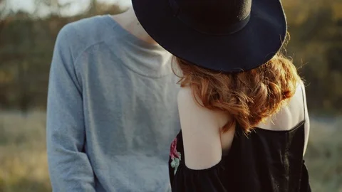 Back view of couple in love kisses and c... | Stock Video | Pond5