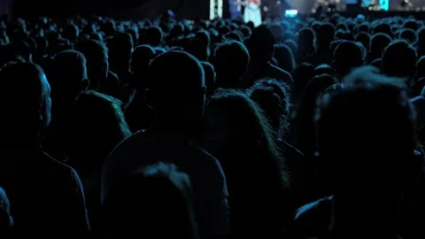 Back view of a crowd of people at an out... | Stock Video | Pond5