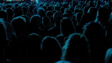 Back view of a crowd of people at an out... | Stock Video | Pond5