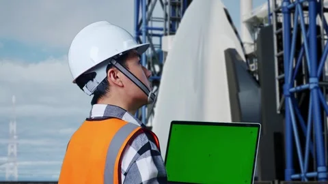 Back View Of Engineer Working On A Green... | Stock Video | Pond5