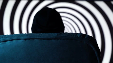 Back view of Evil man sitting on chair w... | Stock Video | Pond5