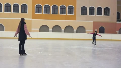 Back view of a female figure skating coa... | Stock Video | Pond5