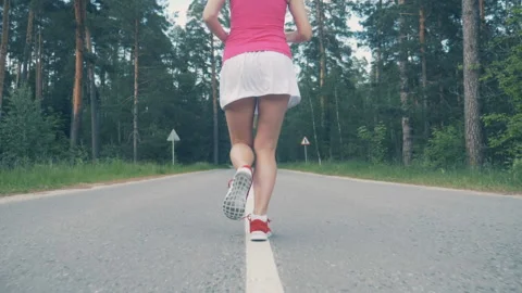 Back view of a female lower body while j... | Stock Video | Pond5