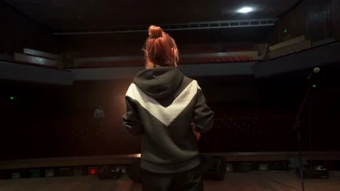 Back view of female singer singing and d... | Stock Video | Pond5