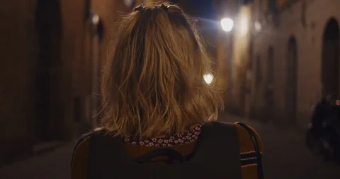 Back view female tourist with backpack o... | Stock Video | Pond5