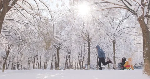 Back view of a happy man running with la... | Stock Video | Pond5