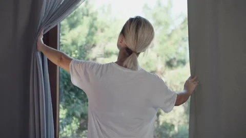 Back view of happy rested woman opening ... | Stock Video | Pond5