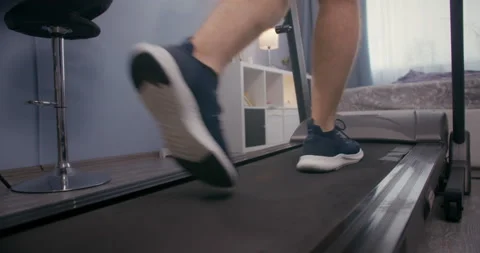 Back view of legs having workout on trea... | Stock Video | Pond5