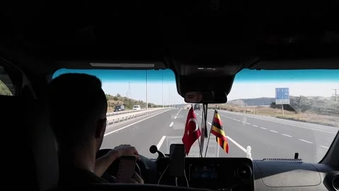 Back view Man driver on the road with st... | Stock Video | Pond5