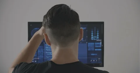 Back view of man programmer working on c... | Stock Video | Pond5
