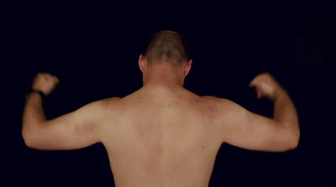 Back view of man showing arms and muscle... | Stock Video | Pond5