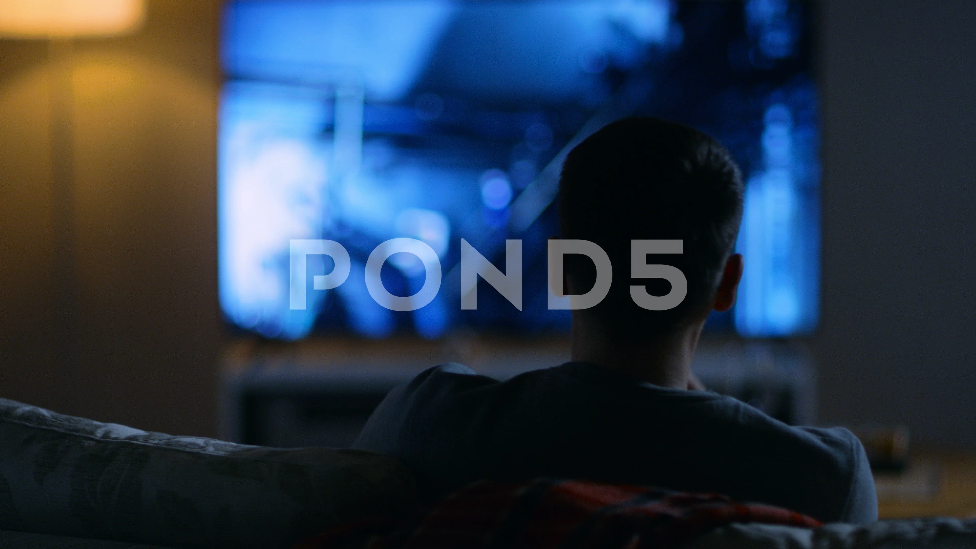 Man Watching Tv At Night