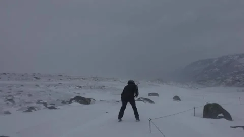 Back View, Man Slipping and Falling on I... | Stock Video | Pond5