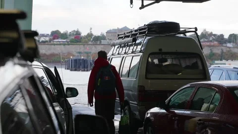 Back View of Man Walking Between Cars an... | Stock Video | Pond5