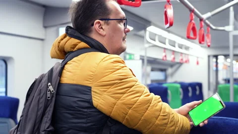 Back view of man watch smart phone with ... | Stock Video | Pond5