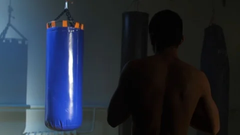 Back view of muscular male boxer punchin... | Stock Video | Pond5