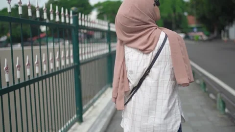 back view os asian muslim woman walking ... | Stock Video | Pond5