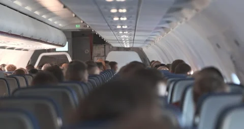 Back view, passengers sitting inside air... | Stock Video | Pond5