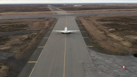Back view of private jet taxiing on flig... | Stock Video | Pond5