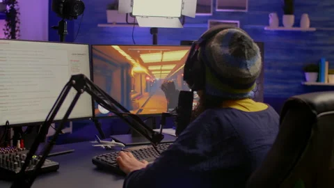 Back view of pro streamer playing game c... | Stock Video | Pond5