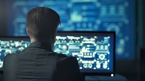 Back view of programmer working on compu... | Stock Video | Pond5