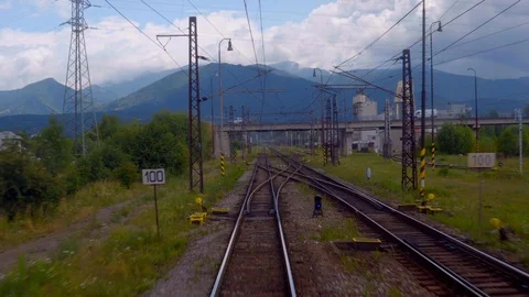 Back view of railroad train pass under t... | Stock Video | Pond5