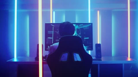 Back View Shot of the Professional Gamer... | Stock Video | Pond5